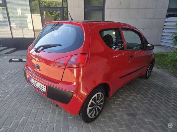 Red Mitsubishi Colt 2008 in Vilnius, with an engine capacity of 1.12 L and mileage of 125 thousand km for 1300 €, photo 7 on AUTOMOTO.COM.LV