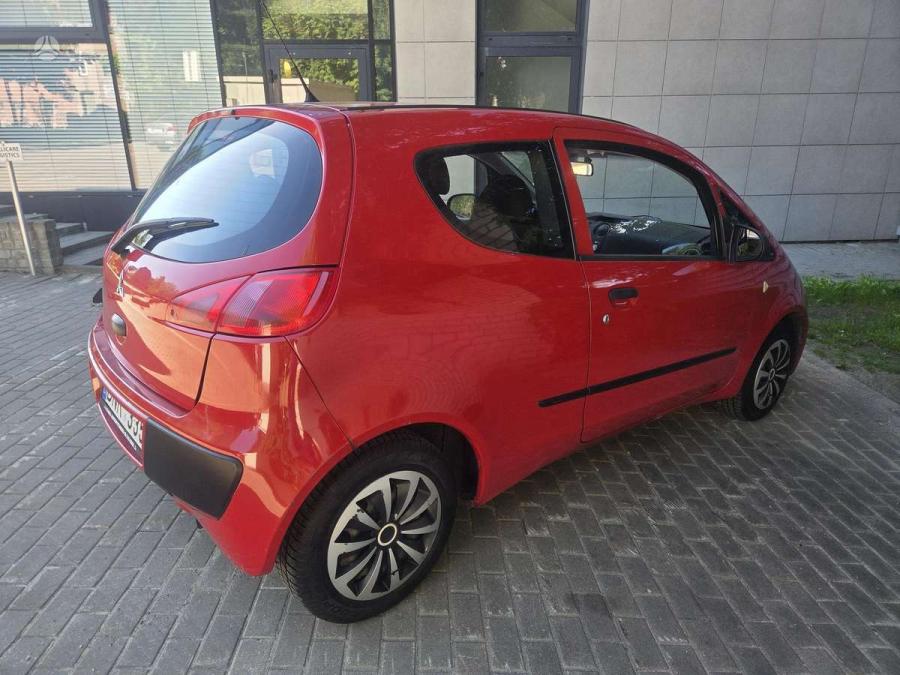 Red Mitsubishi Colt 2008 in Vilnius, with an engine capacity of 1.12 L and mileage of 125 thousand km for 1300 €, photo 9 on AUTOMOTO.COM.LV
