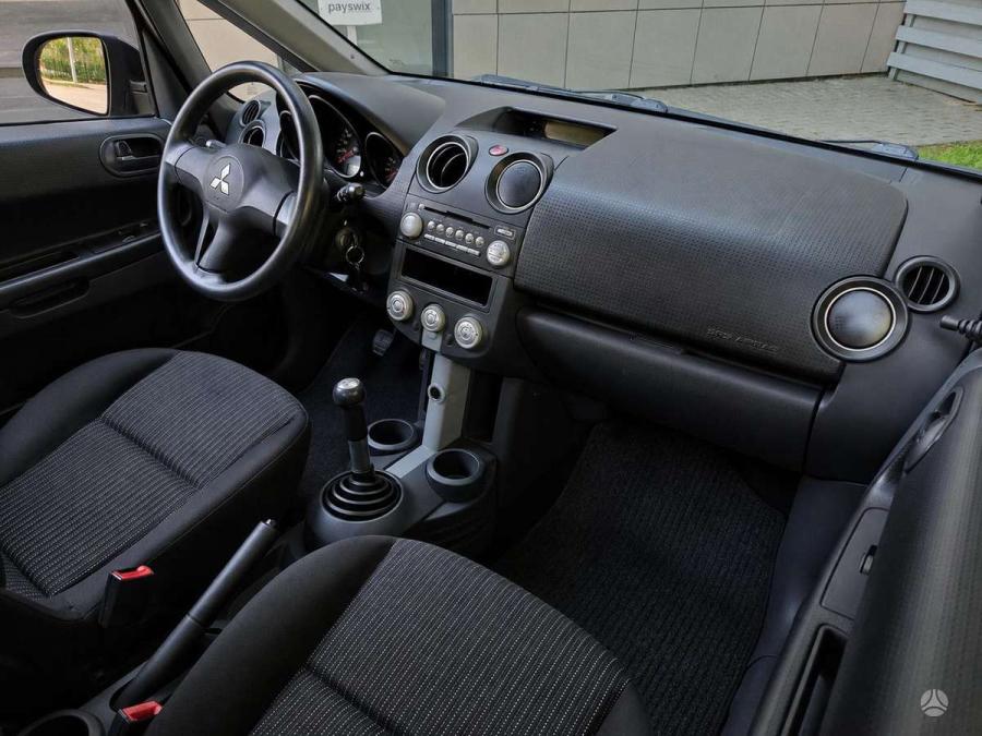 Red Mitsubishi Colt 2008 in Vilnius, with an engine capacity of 1.12 L and mileage of 125 thousand km for 1300 €, photo 12 on AUTOMOTO.COM.LV