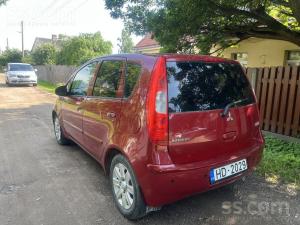 Sarkans Mitsubishi Colt 2008 Jelgava, ar dzinēja tilpumu 1.30 L un nobraukumu 207 tūkst. km par 970 €, foto  vietnē AUTOMOTO.COM.LV