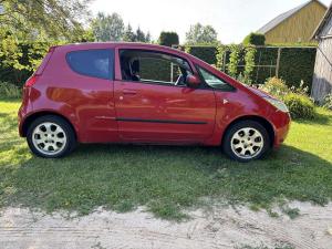 Red Mitsubishi Colt 2008 in Alytus, with an engine capacity of 1.33 L and mileage of 167 thousand km for 1100 €, photo  on AUTOMOTO.COM.LV