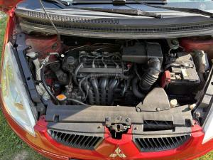 Red Mitsubishi Colt 2008 in Alytus, with an engine capacity of 1.33 L and mileage of 167 thousand km for 1100 €, photo 6 on AUTOMOTO.COM.LV