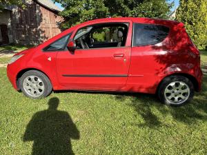 Red Mitsubishi Colt 2008 in Alytus, with an engine capacity of 1.33 L and mileage of 167 thousand km for 1100 €, photo 9 on AUTOMOTO.COM.LV