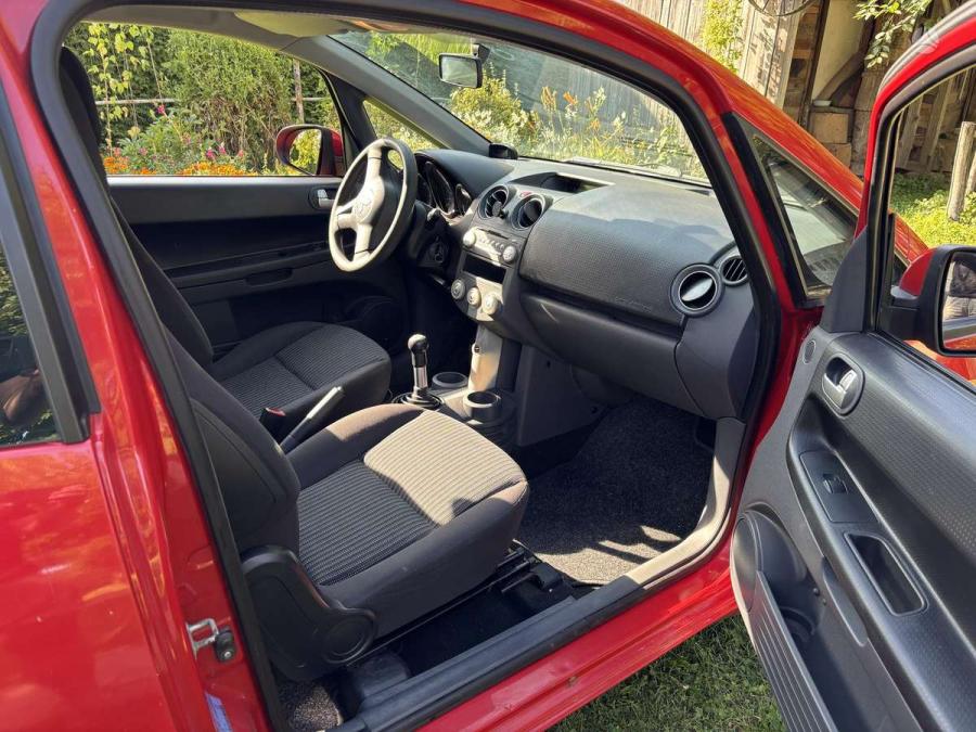 Red Mitsubishi Colt 2008 in Alytus, with an engine capacity of 1.33 L and mileage of 167 thousand km for 1100 €, photo 12 on AUTOMOTO.COM.LV