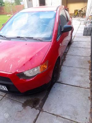 Sarkans Mitsubishi Colt 2009 Kretinga, ar dzinēja tilpumu 1.12 L un nobraukumu 171 tūkst. km par 800 €, foto 3 vietnē AUTOMOTO.COM.LV