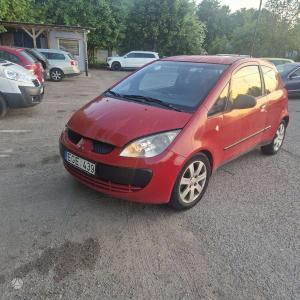 Sarkans Mitsubishi Colt 2009 Klaipėda, ar dzinēja tilpumu 1.12 L un nobraukumu 186 tūkst. km par 500 €, foto  vietnē AUTOMOTO.COM.LV