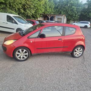 Sarkans Mitsubishi Colt 2009 Klaipėda, ar dzinēja tilpumu 1.12 L un nobraukumu 186 tūkst. km par 500 €, foto 3 vietnē AUTOMOTO.COM.LV