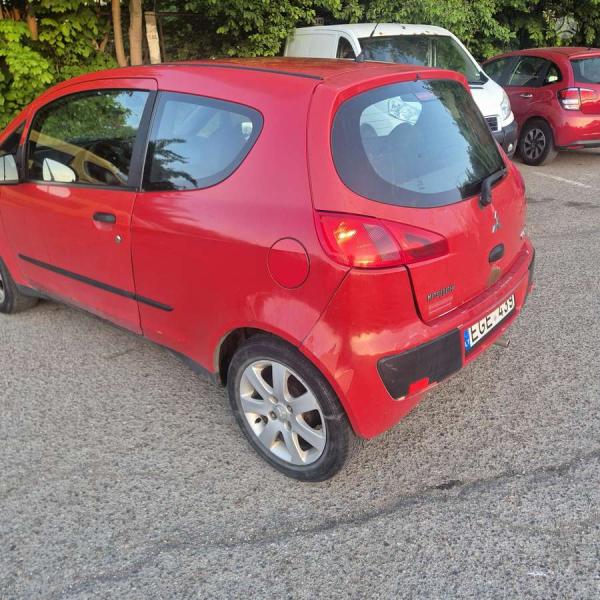 Red Mitsubishi Colt 2009 in Klaipeda, with an engine capacity of 1.12 L and mileage of 186 thousand km for 500 €, photo 5 on AUTOMOTO.COM.LV