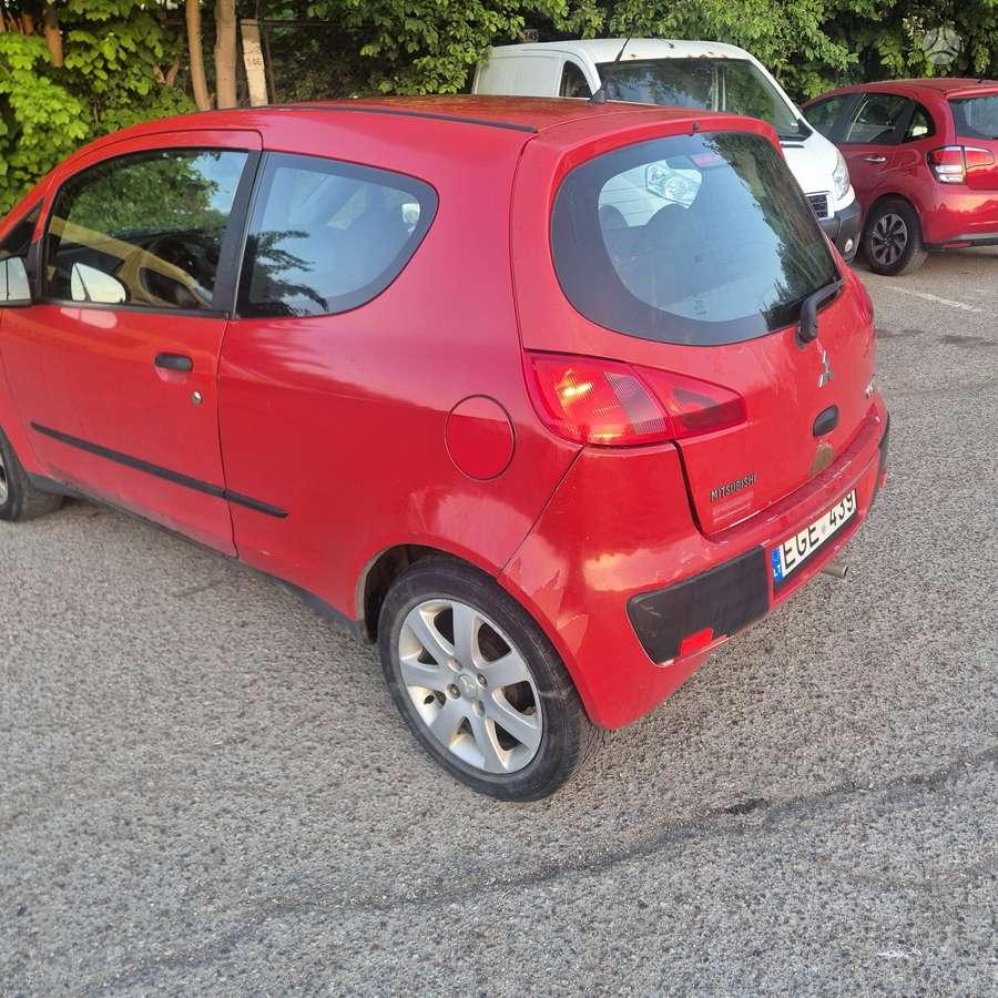 Sarkans Mitsubishi Colt 2009 Klaipėda, ar dzinēja tilpumu 1.12 L un nobraukumu 186 tūkst. km par 500 €, foto 6 vietnē AUTOMOTO.COM.LV