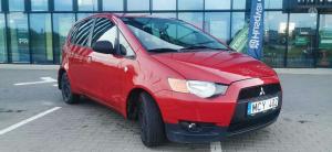 Red Mitsubishi Colt 2010 in Vilnius, with an engine capacity of 1.12 L and mileage of 241 thousand km for 1750 €, photo 3 on AUTOMOTO.COM.LV