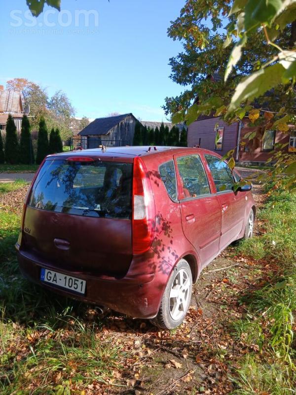 Red Mitsubishi Colt 2006 in Valmiera, with an engine capacity of 1.30 L and mileage of 350 thousand km for 176 €, photo 3 on AUTOMOTO.COM.LV