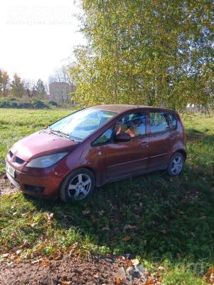 Red Mitsubishi Colt 2006 in Valmiera, with an engine capacity of 1.30 L and mileage of 350 thousand km for 176 €, photo 4 on AUTOMOTO.COM.LV