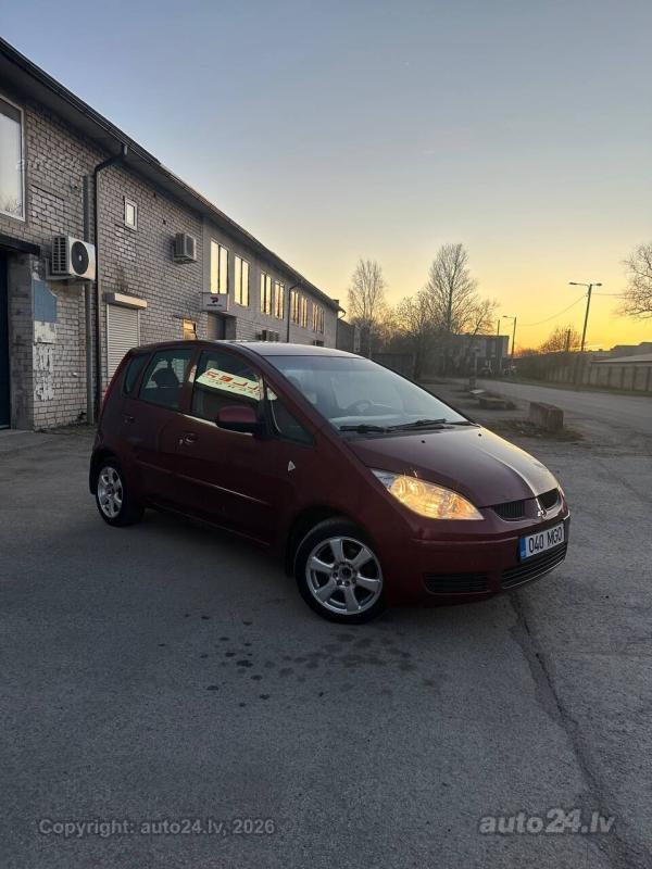 Red Mitsubishi Colt 2006 in Tallinn, with an engine capacity of 1.30 L and mileage of 120 thousand km for 1990 €, photo 5 on AUTOMOTO.COM.LV