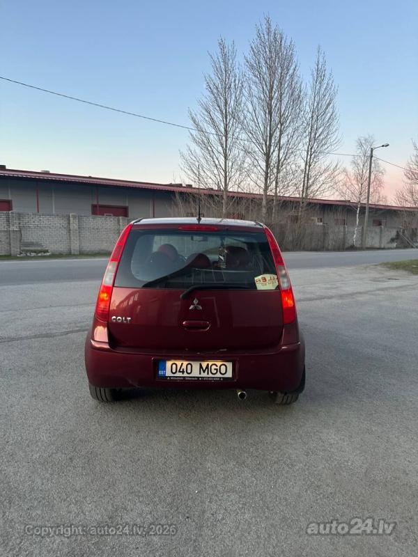 Red Mitsubishi Colt 2006 in Tallinn, with an engine capacity of 1.30 L and mileage of 120 thousand km for 1990 €, photo 6 on AUTOMOTO.COM.LV