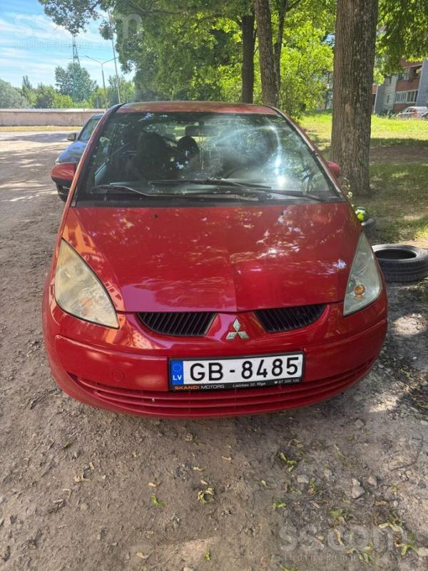 Red Mitsubishi Colt 2006 in Riga, with an engine capacity of 1.30 L and mileage of 260 thousand km for 1000 €, photo 1 on AUTOMOTO.COM.LV