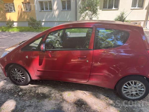 Red Mitsubishi Colt 2006 in Riga, with an engine capacity of 1.30 L and mileage of 260 thousand km for 1000 €, photo 2 on AUTOMOTO.COM.LV