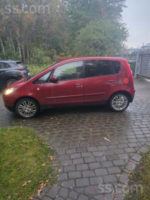 Red Mitsubishi Colt 2007 in Riga, with an engine capacity of 1.30 L and mileage of 144 thousand km for 500 €, photo 3 on AUTOMOTO.COM.LV