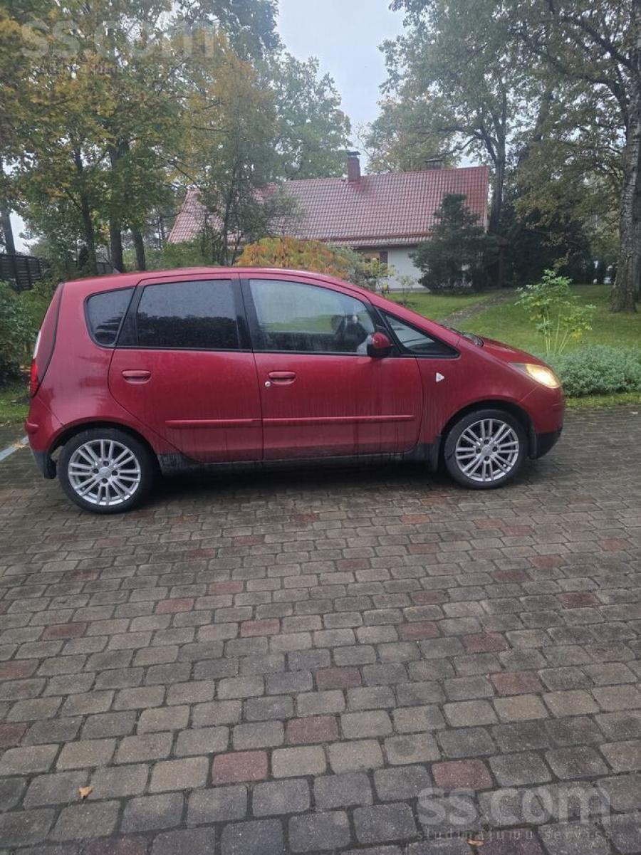 Red Mitsubishi Colt 2007 in Riga, with an engine capacity of 1.30 L and mileage of 144 thousand km for 500 €, photo 7 on AUTOMOTO.COM.LV