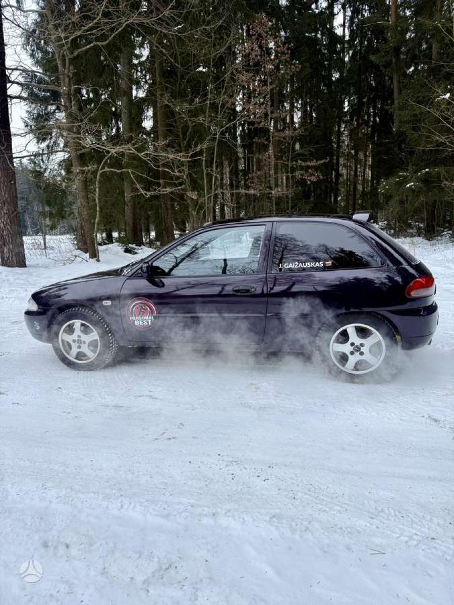 Violets Mitsubishi Colt 1994 Tauragė, ar dzinēja tilpumu 1.60 L un nobraukumu 10 tūkst. km par 3700 €, foto 8 vietnē AUTOMOTO.COM.LV