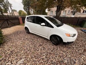 White Mitsubishi Colt 2010 in Riga, with an engine capacity of 1.30 L and mileage of 201 thousand km for 2750 €, photo 4 on AUTOMOTO.COM.LV