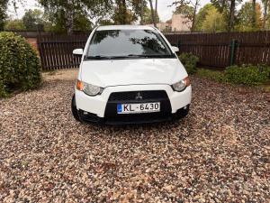 White Mitsubishi Colt 2010 in Riga, with an engine capacity of 1.30 L and mileage of 201 thousand km for 2750 €, photo 6 on AUTOMOTO.COM.LV