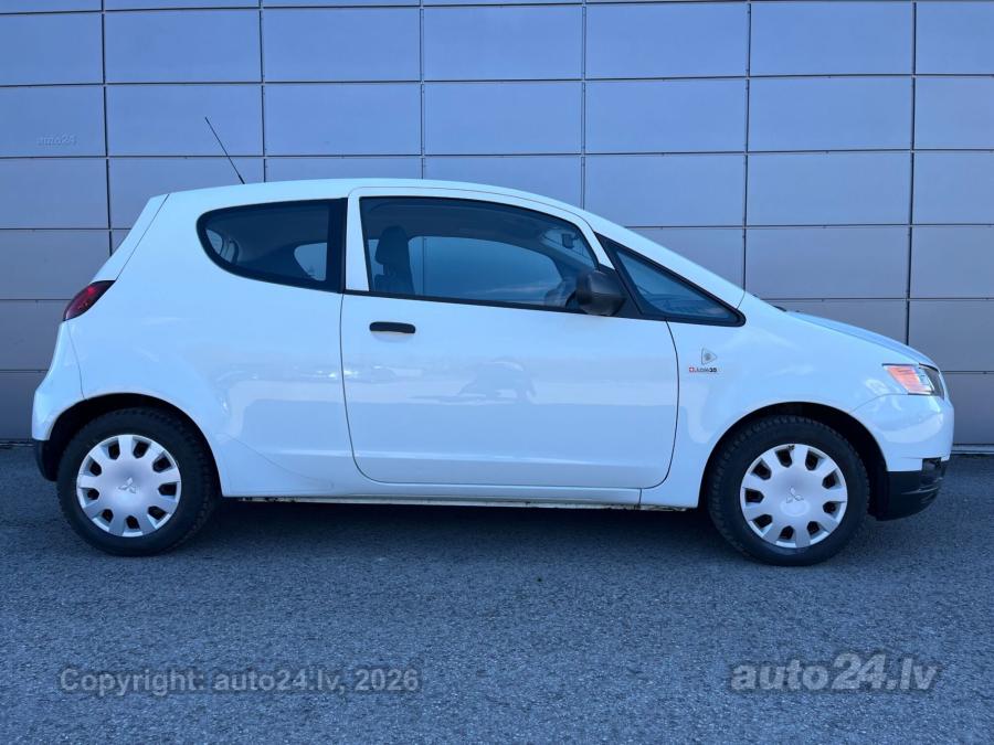 White Mitsubishi Colt 2012 in Kuressaare, with an engine capacity of 1.10 L and mileage of 165 thousand km for 2850 €, photo 8 on AUTOMOTO.COM.LV