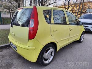 Yellow Mitsubishi Colt 2006 in Riga, with an engine capacity of 1.10 L and mileage of 0 thousand km for 350 €, photo 4 on AUTOMOTO.COM.LV