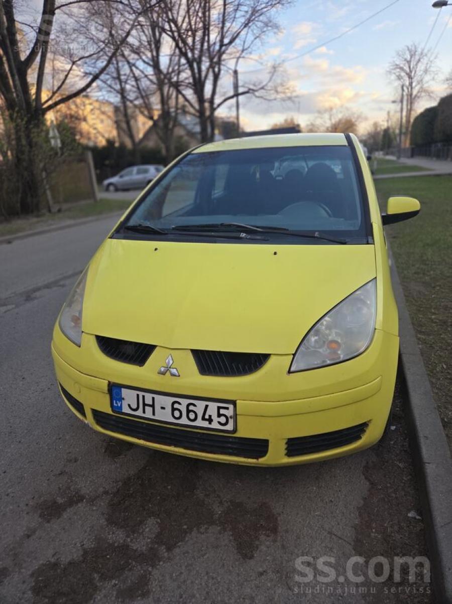 Yellow Mitsubishi Colt 2006 in Riga, with an engine capacity of 1.10 L and mileage of 0 thousand km for 350 €, photo 7 on AUTOMOTO.COM.LV