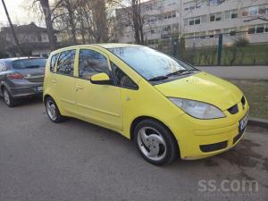 Yellow Mitsubishi Colt 2006 in Riga, with an engine capacity of 1.10 L and mileage of 0 thousand km for 350 €, photo 8 on AUTOMOTO.COM.LV