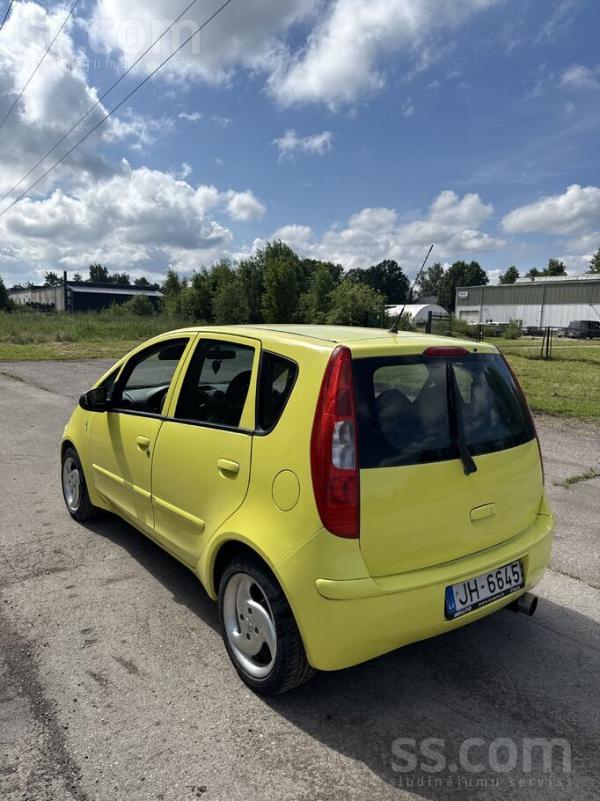 Yellow Mitsubishi Colt 2006 in Ogre, with an engine capacity of 1.10 L and mileage of 210 thousand km for 850 €, photo 4 on AUTOMOTO.COM.LV