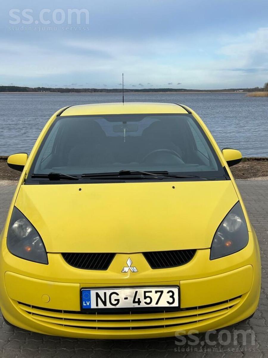 Yellow Mitsubishi Colt 2008 in Riga, with an engine capacity of 1.30 L and mileage of 221 thousand km for 2490 €, photo 3 on AUTOMOTO.COM.LV