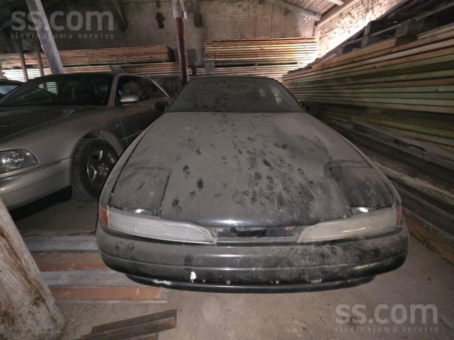 Black Mitsubishi Eclipse 1992 in Daugavpils, with an engine capacity of 2.00 L and mileage of 225 thousand km for 1000 €, photo 1 on AUTOMOTO.COM.LV