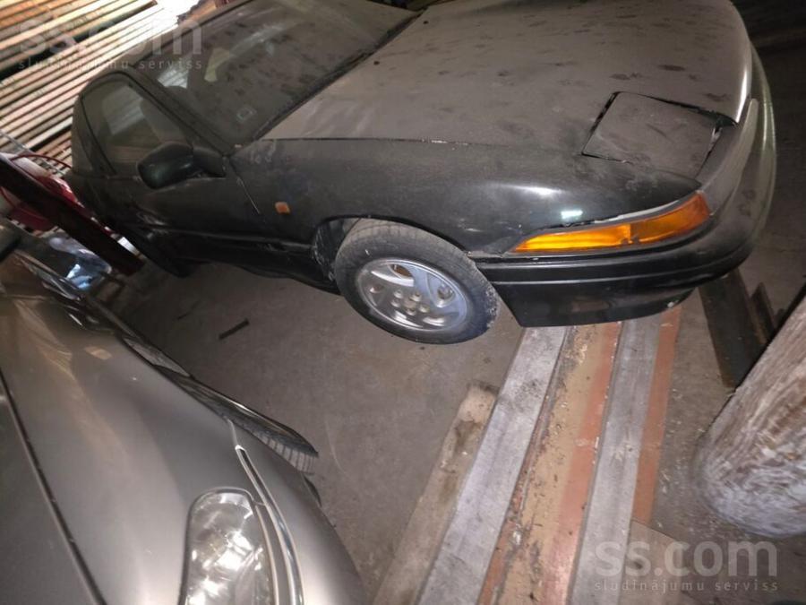Black Mitsubishi Eclipse 1992 in Daugavpils, with an engine capacity of 2.00 L and mileage of 225 thousand km for 1000 €, photo 3 on AUTOMOTO.COM.LV