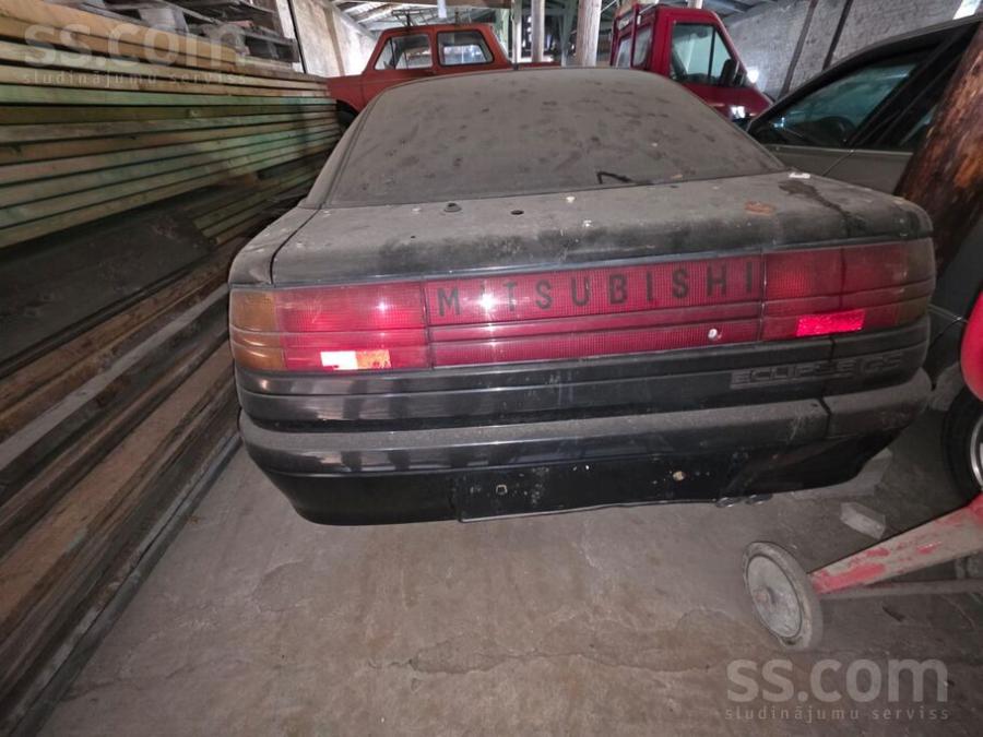 Black Mitsubishi Eclipse 1992 in Daugavpils, with an engine capacity of 2.00 L and mileage of 225 thousand km for 1000 €, photo 7 on AUTOMOTO.COM.LV