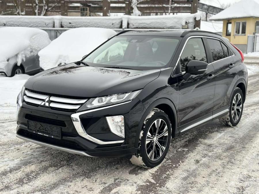 Black Mitsubishi Eclipse Cross 2018 in Telschi, with an engine capacity of 1.50 L and mileage of 138 thousand km for 17800 €, photo 5 on AUTOMOTO.COM.LV