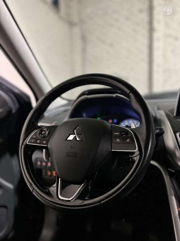 Black Mitsubishi Eclipse Cross 2018 in Klaipeda, with an engine capacity of 1.50 L and mileage of 212 thousand km for 13999 €, photo 7 on AUTOMOTO.COM.LV