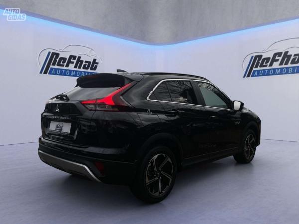 Black Mitsubishi Eclipse Cross 2022 in Kaunas, with an engine capacity of 2.40 L and mileage of 93 thousand km for 21594 €, photo 7 on AUTOMOTO.COM.LV