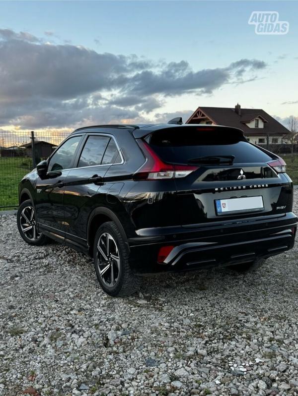 Black Mitsubishi Eclipse Cross 2022 in Klaipeda, with an engine capacity of 2.40 L and mileage of 63 thousand km for 21400 €, photo 6 on AUTOMOTO.COM.LV