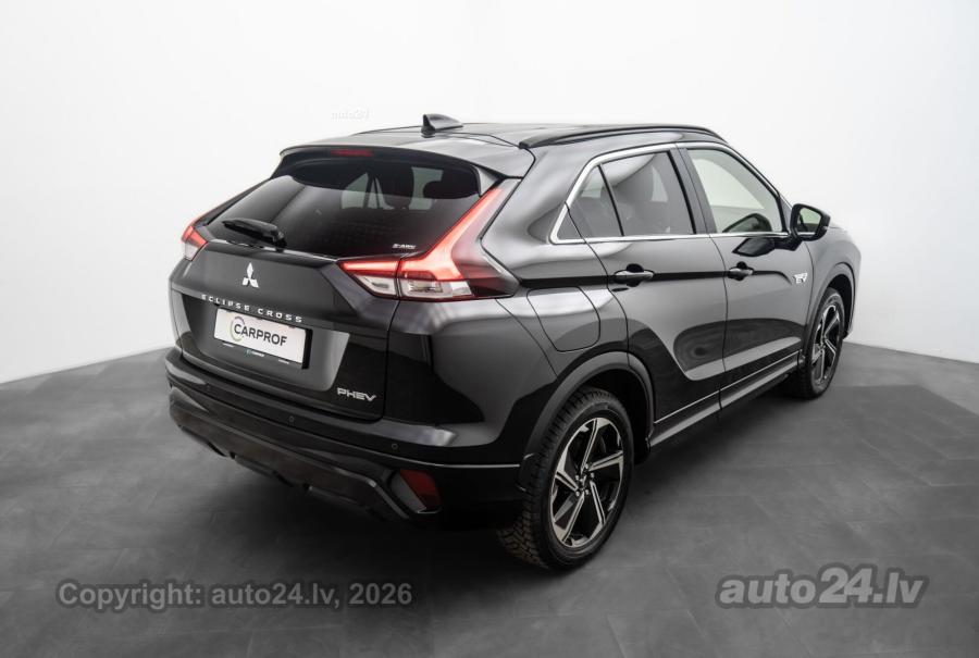 Black Mitsubishi Eclipse Cross 2022 in Tallinn, with an engine capacity of 2.40 L and mileage of 119 thousand km for 18999 €, photo 6 on AUTOMOTO.COM.LV