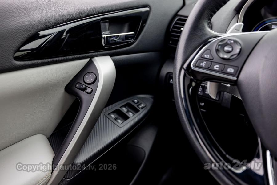 Blue Mitsubishi Eclipse Cross 2023 in Tallinn, with an engine capacity of 2.40 L and mileage of 26 thousand km for 26900 €, photo 14 on AUTOMOTO.COM.LV