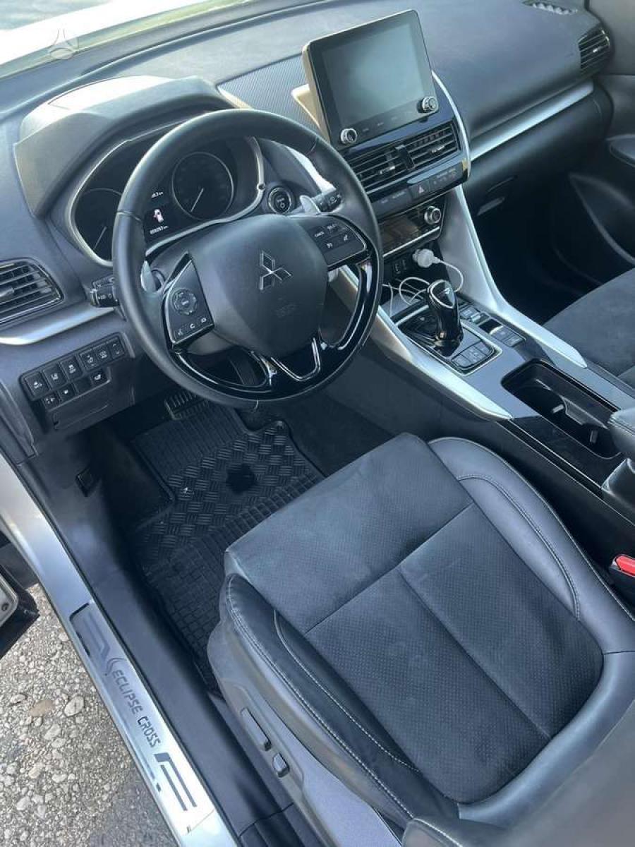 Grey Mitsubishi Eclipse Cross 2021 in Marijampole, with an engine capacity of 2.40 L and mileage of 60 thousand km for 17200 €, photo 12 on AUTOMOTO.COM.LV