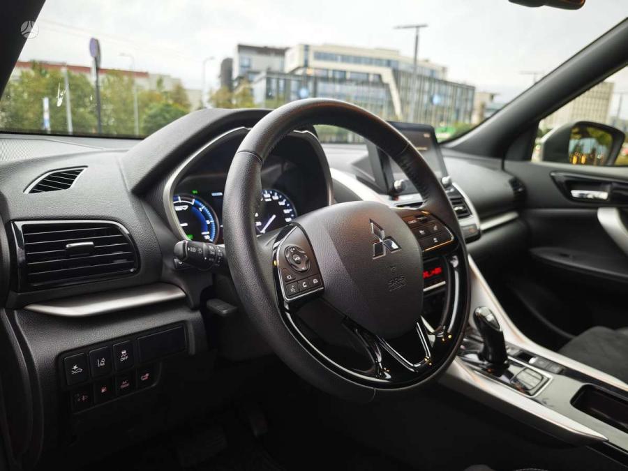 Grey Mitsubishi Eclipse Cross 2023 in Vilnius, with an engine capacity of 2.36 L and mileage of 41 thousand km for 21600 €, photo 14 on AUTOMOTO.COM.LV
