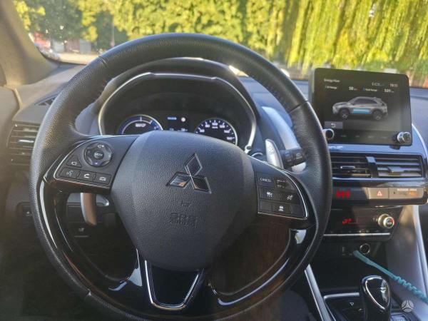 Grey Mitsubishi Eclipse Cross 2023 in Marijampole, with an engine capacity of 2.36 L and mileage of 83 thousand km for 20200 €, photo 8 on AUTOMOTO.COM.LV