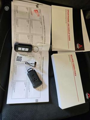 Grey Mitsubishi Eclipse Cross 2024 in Vilnius, with an engine capacity of 2.36 L and mileage of 83 thousand km for 21600 €, photo 16 on AUTOMOTO.COM.LV