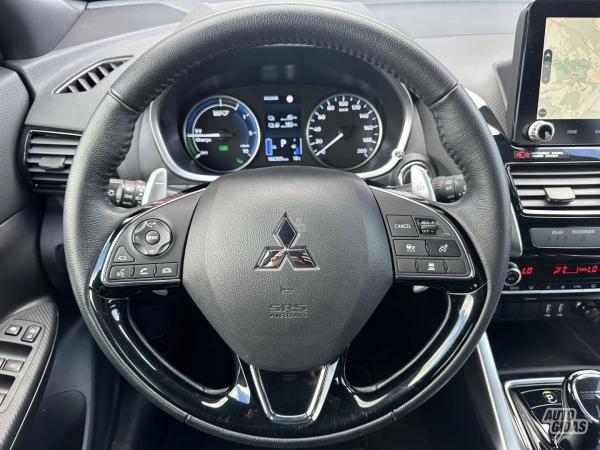 Grey Mitsubishi Eclipse Cross 2024 in Avizieniai, with an engine capacity of 2.40 L and mileage of 102 thousand km for 22950 €, photo 7 on AUTOMOTO.COM.LV