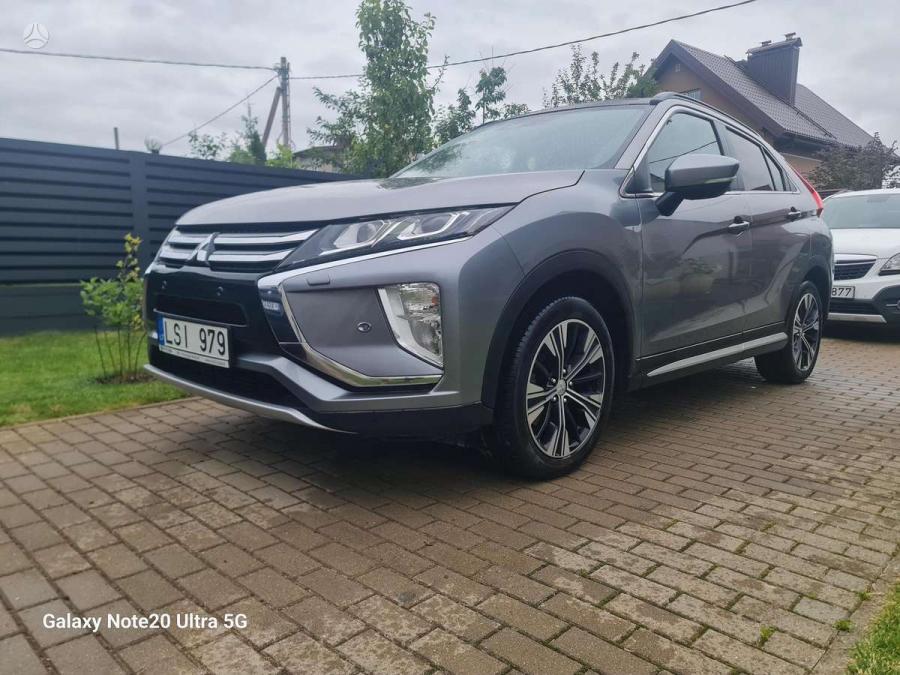 Grey Mitsubishi Eclipse Cross 2021 in Vilnius, with an engine capacity of 1.50 L and mileage of 109 thousand km for 14500 €, photo 1 on AUTOMOTO.COM.LV