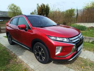 Red Mitsubishi Eclipse Cross 2018 in Jonava, with an engine capacity of 1.50 L and mileage of 144 thousand km for 12500 €, photo 4 on AUTOMOTO.COM.LV