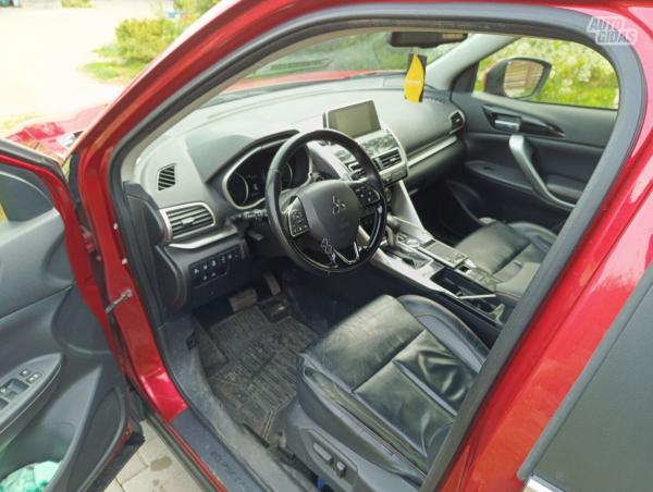 Red Mitsubishi Eclipse Cross 2018 in Jonava, with an engine capacity of 1.50 L and mileage of 144 thousand km for 12500 €, photo 6 on AUTOMOTO.COM.LV