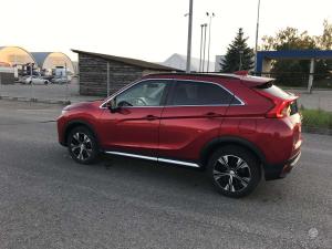 Red Mitsubishi Eclipse Cross 2019 in Marijampole, with an engine capacity of 1.50 L and mileage of 126 thousand km for 13500 €, photo 7 on AUTOMOTO.COM.LV