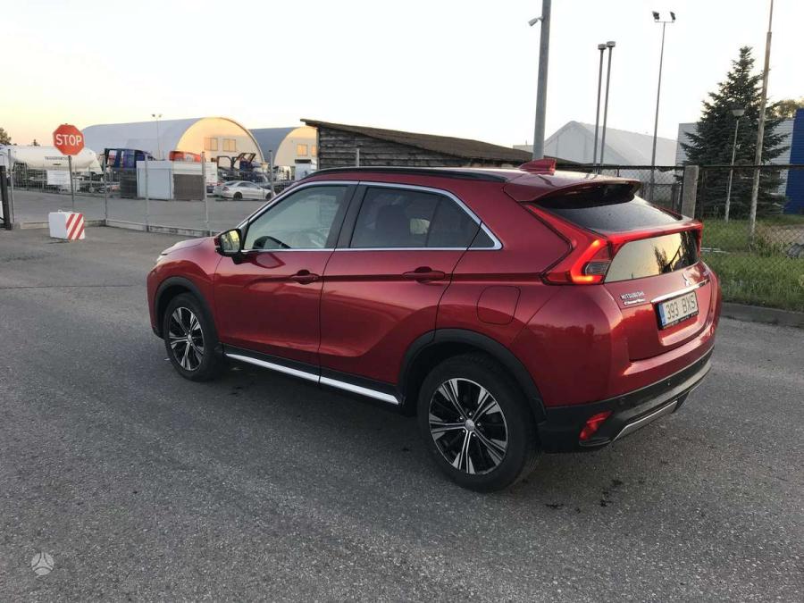 Red Mitsubishi Eclipse Cross 2019 in Marijampole, with an engine capacity of 1.50 L and mileage of 126 thousand km for 13500 €, photo 8 on AUTOMOTO.COM.LV